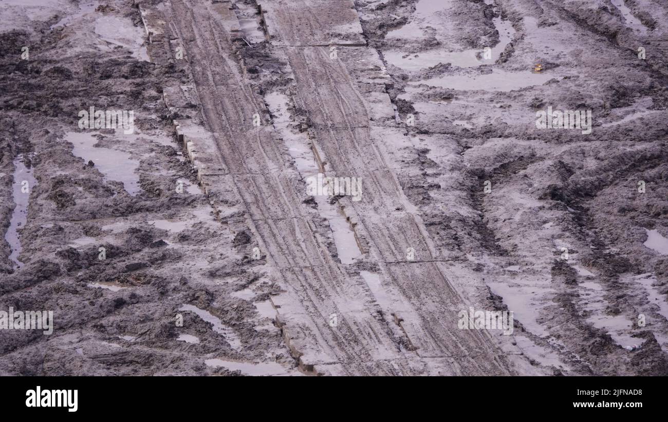 Kiev, Ukraine, October 17, 2018: Workers in the mud of a construction ...