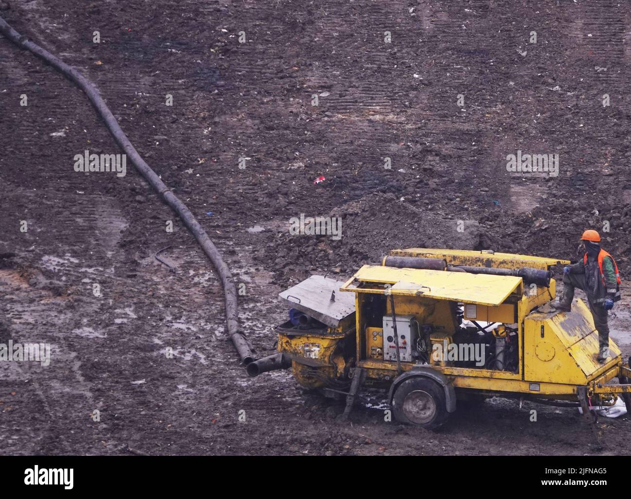 Kiev, Ukraine, October 17, 2018: Workers in the mud of a construction ...