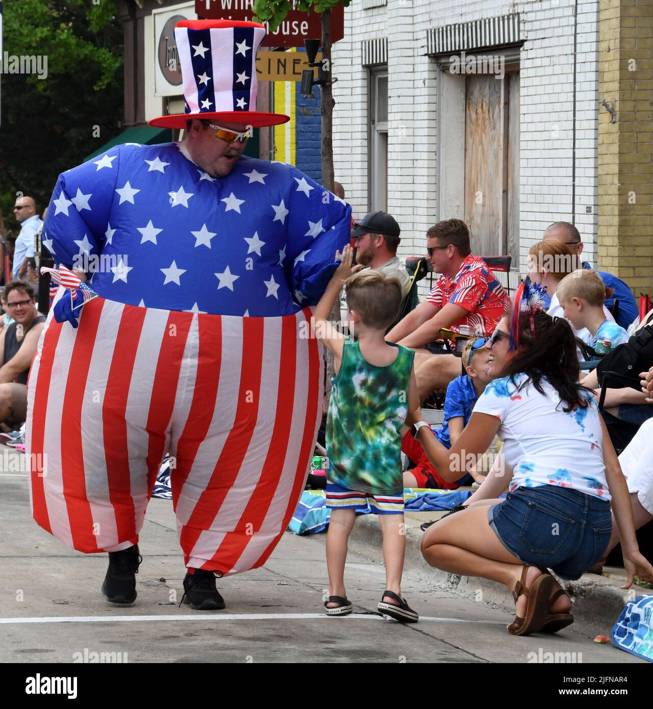 Racine, Wisconsin, USA. 4th July, 2022. An Uncle Sam figure greets ...