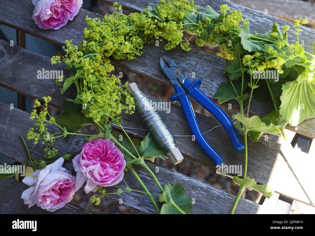 Preparations for a midsummer wreath for Midsummer eve Stock Photo - Alamy