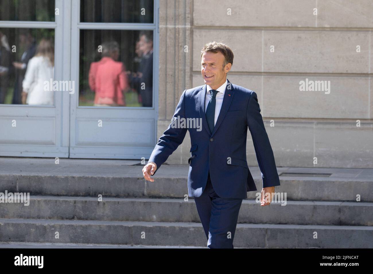 France's President Emmanuel Macron arrives for an official picture ...