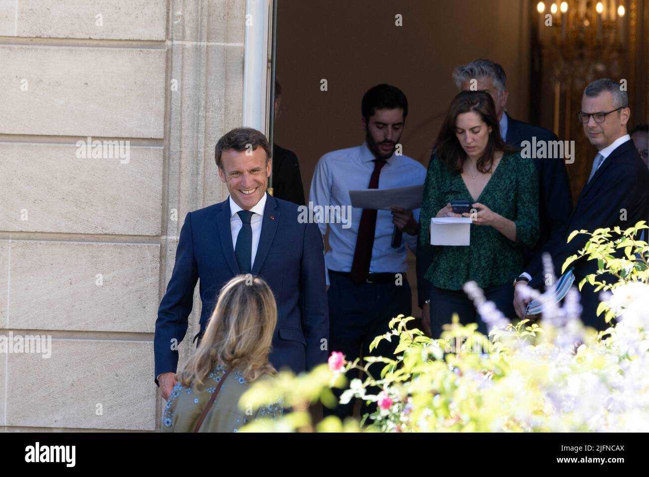France's President Emmanuel Macron arrives for an official picture ...