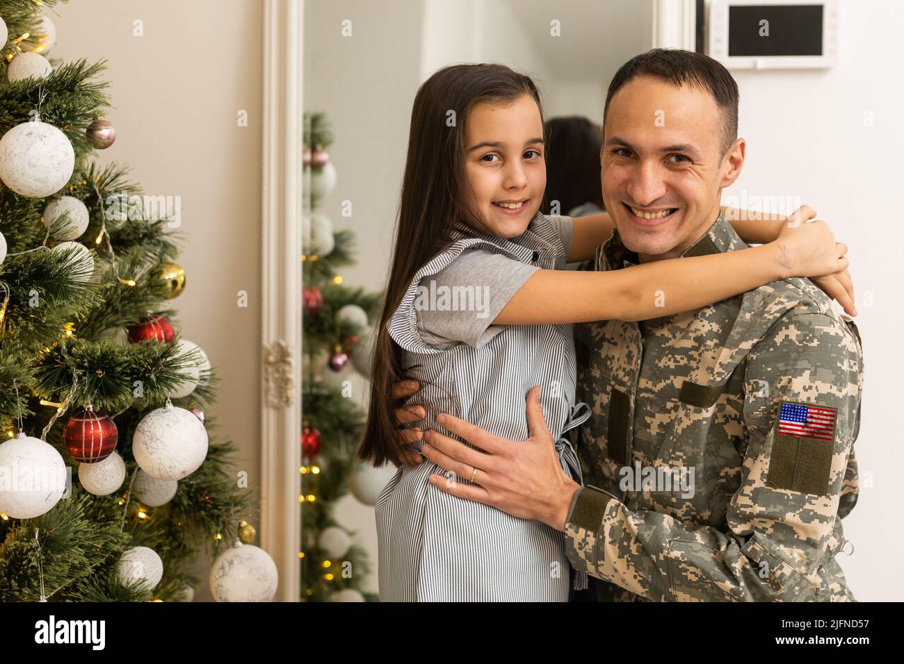 Military Man and his daughter for christmas Stock Photo - Alamy