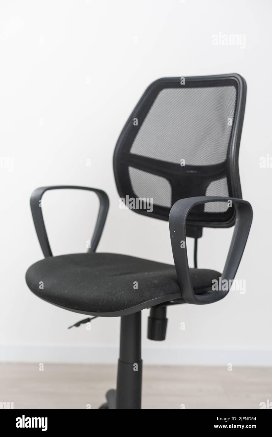 New office chair on the floor, closeup Stock Photo - Alamy