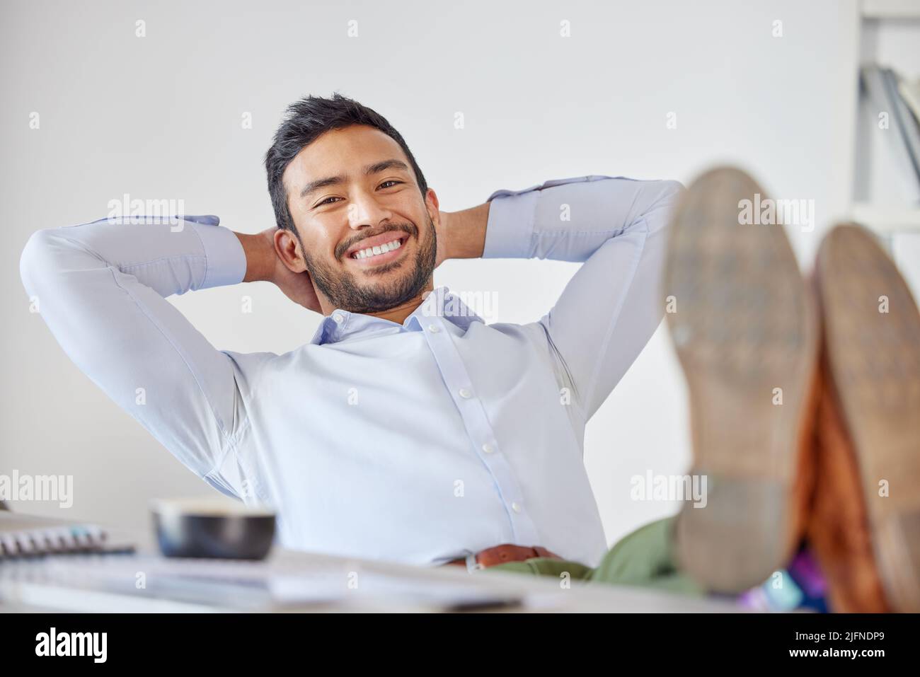 Relaxed looking man feet up hi-res stock photography and images - Alamy