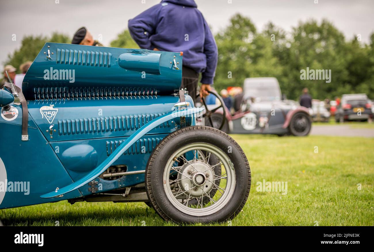 Pre war Austin 7 Nippy with its bonnet up in the paddock Stock Photo ...