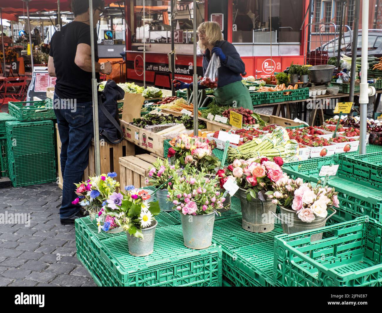 Fresh produce and flowers on sale at the Marktplatz in Basel ...