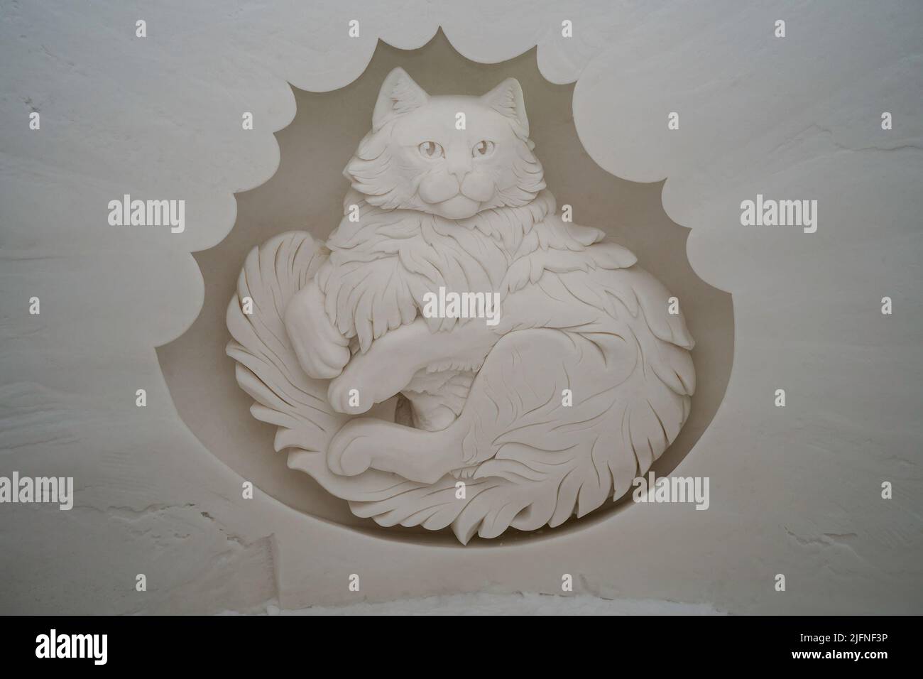 Kemi, Finland - March 21st, 2022: A cat carved of ice, in the Lumilinna ...