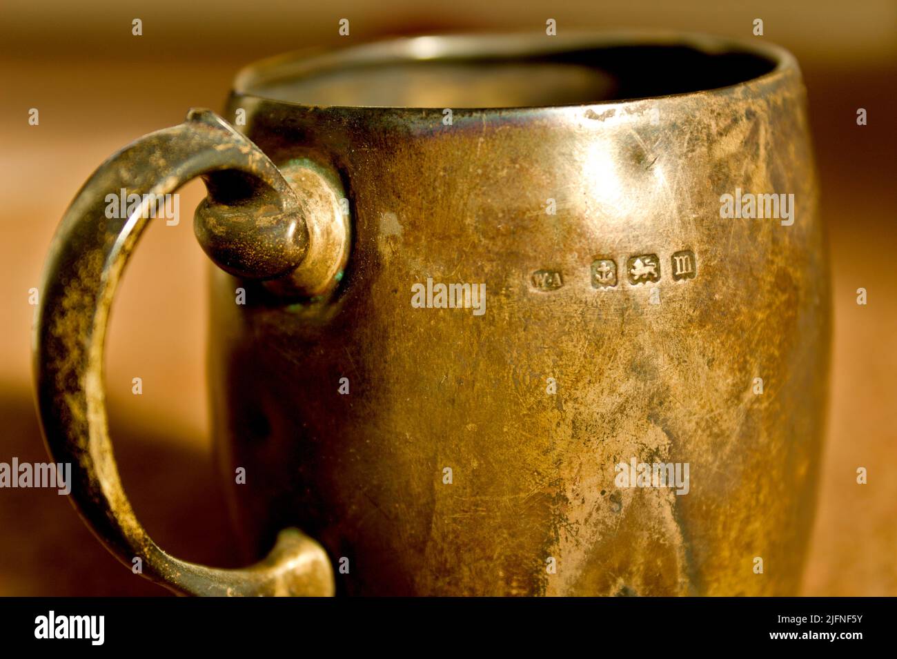 silver mug with British hallmarks Stock Photo - Alamy