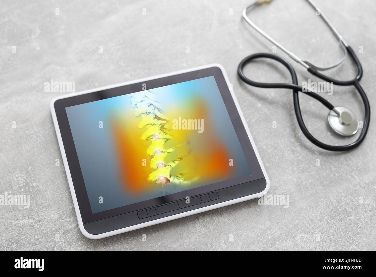Doctor showing x ray on digital tablet hi-res stock photography and ...