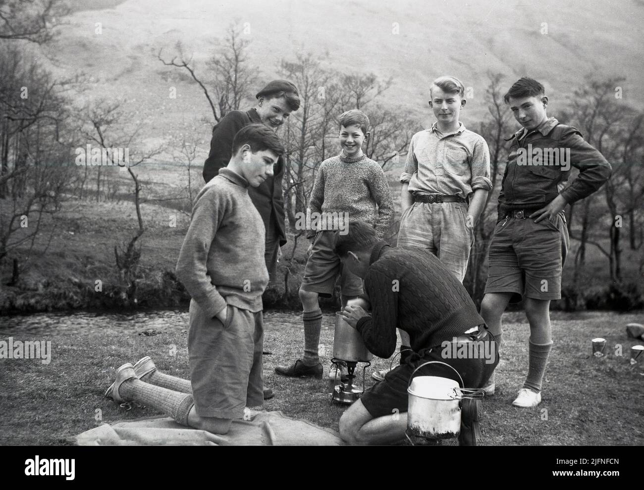 1952, historical, group of boys, possibly scouts, standing on a ...