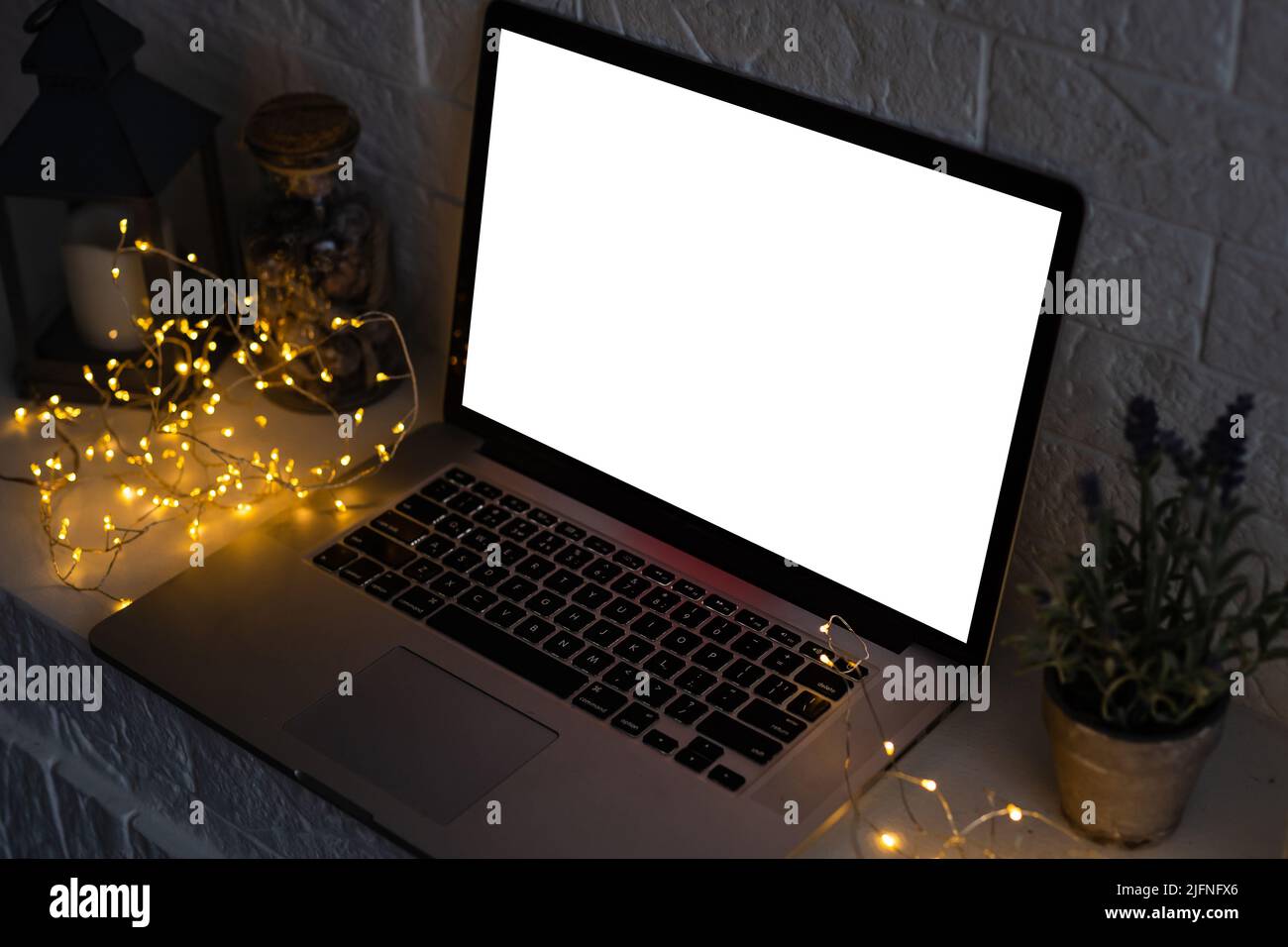 Laptop computer with white blank empty mock up screen on Merry ...