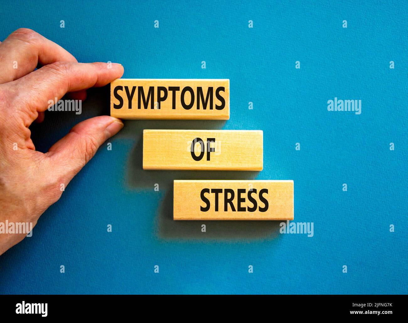 Symptoms of stress symbol. Concept words Symptoms of stress on wooden ...