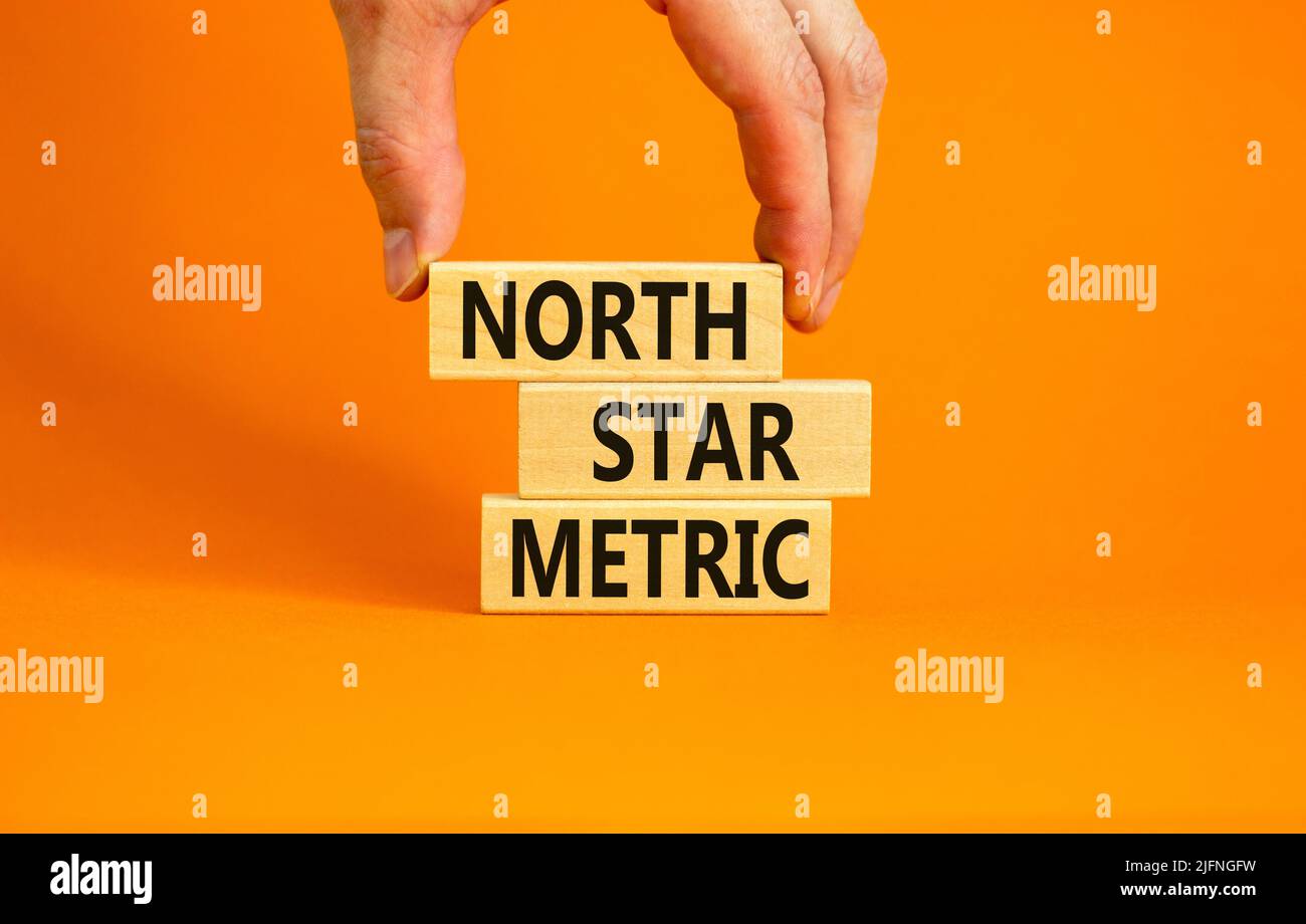 North star metric symbol. Concept words North star metric on wooden ...