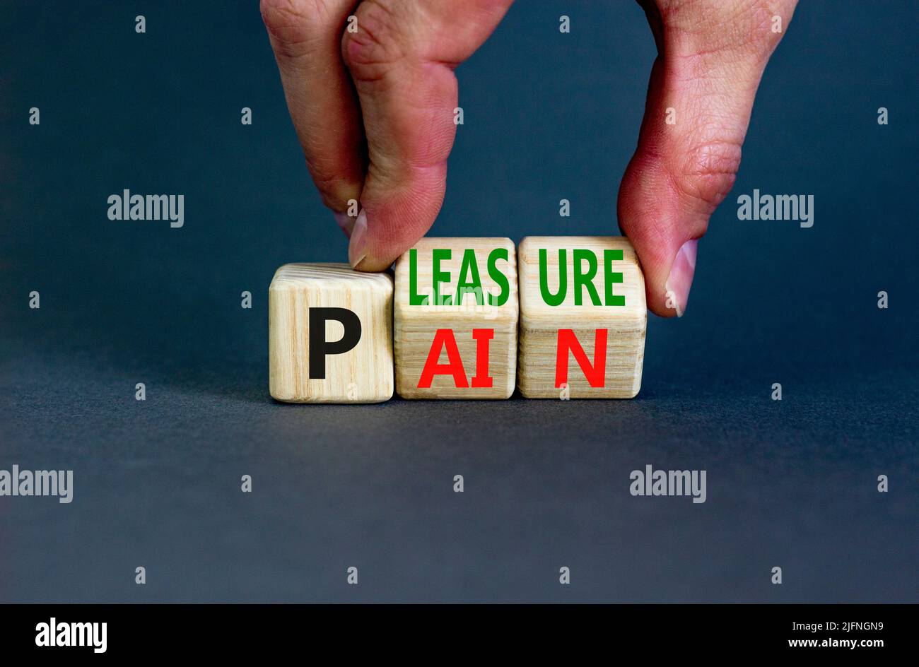 Pain or pleasure symbol. Concept words Pain or Pleasure on wooden cubes ...