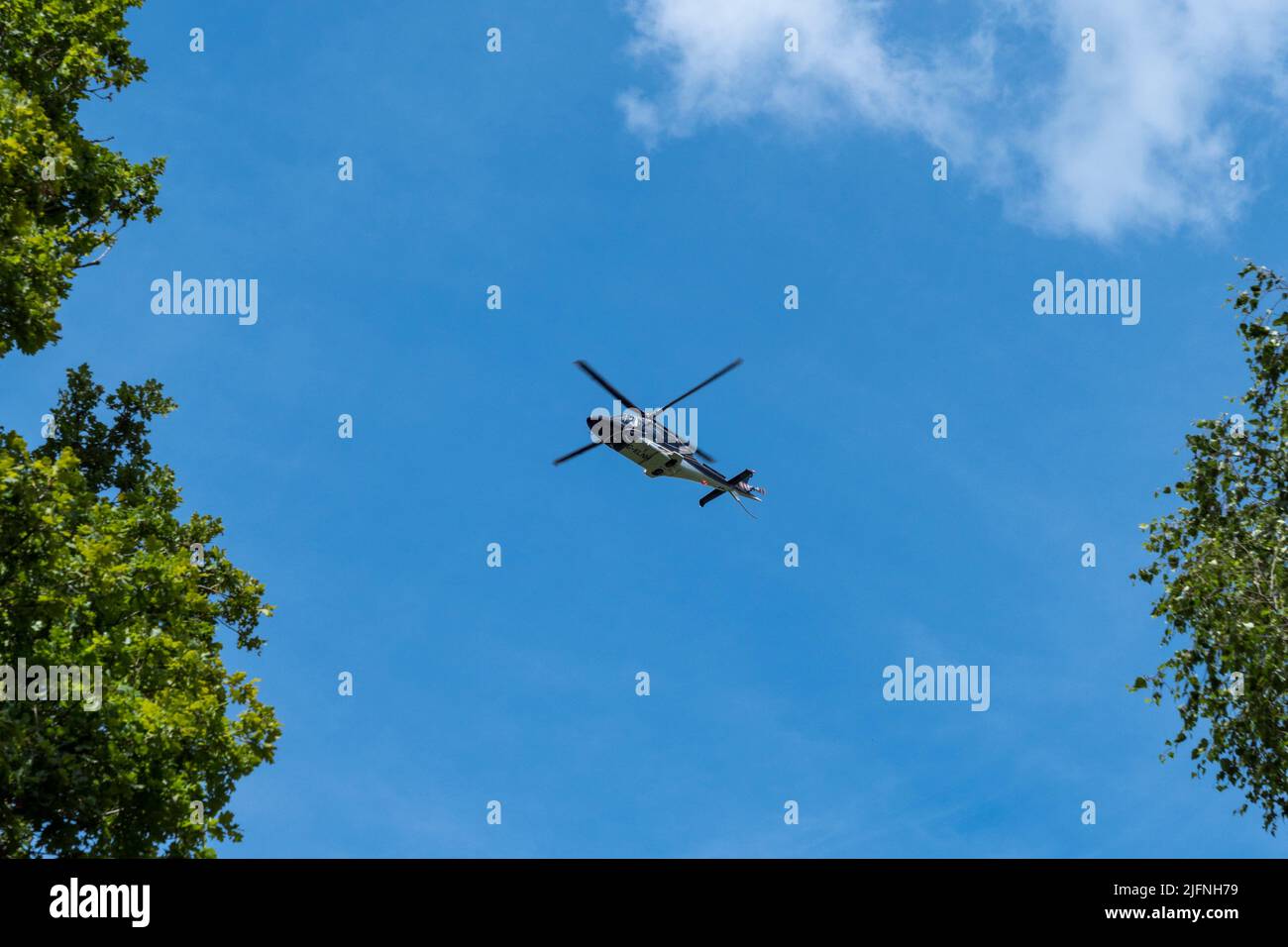 Helicopter flying over Windsor Great Park, Berkshire, UK Stock Photo ...