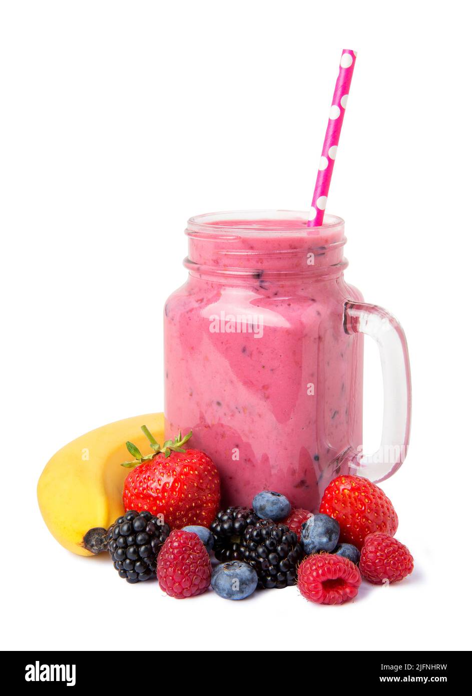Berry mix smoothie with banana and fresh ingredients in a glass jar on ...
