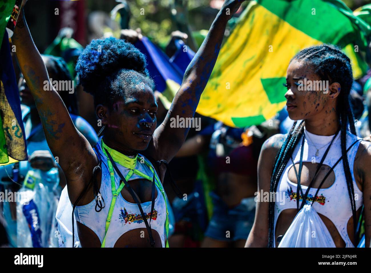 Revellers follow the main float during the parade Stock Photo - Alamy