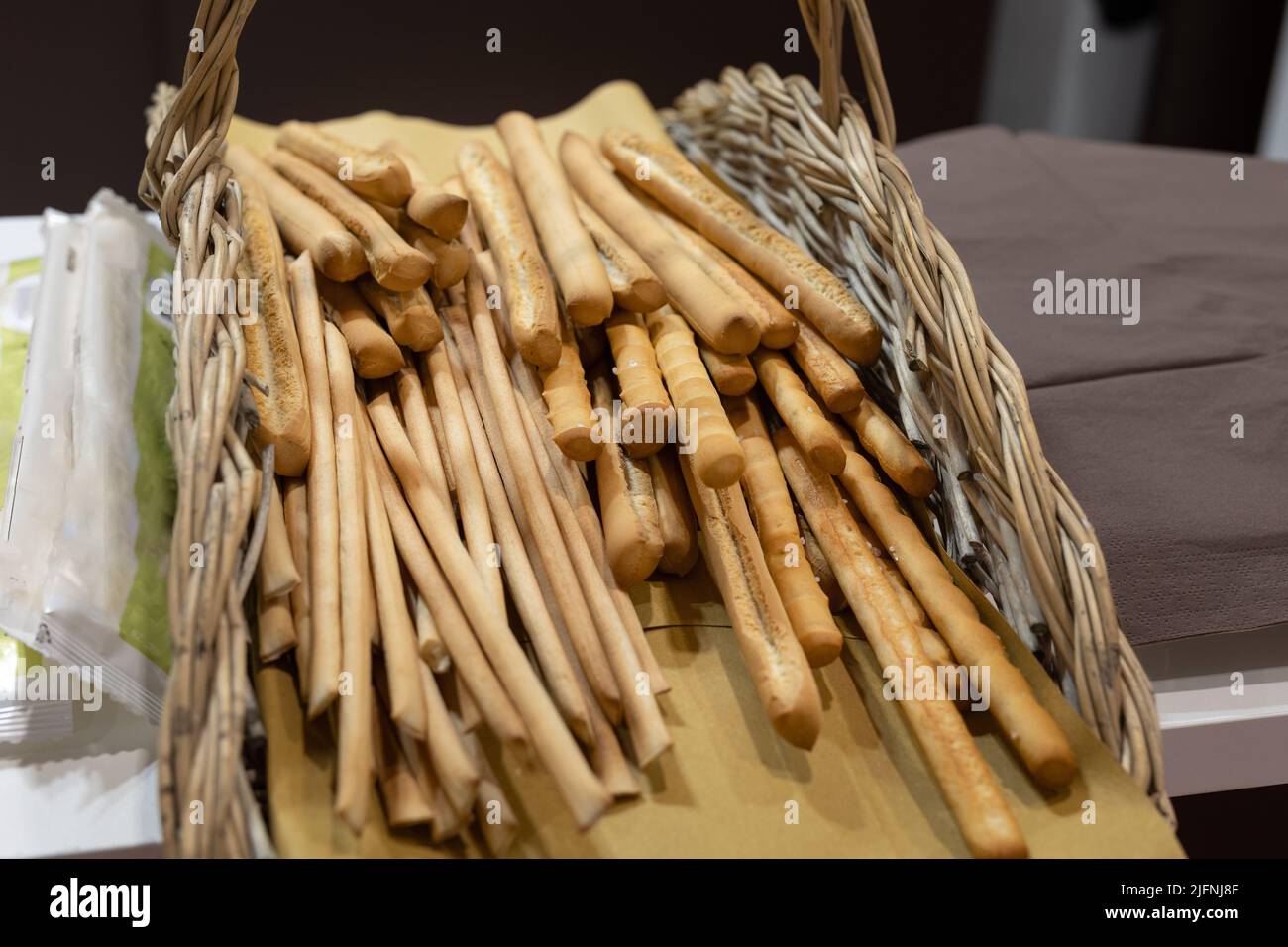 Breadsticks of Different Shapes and Sizes in a Woven Wicker Basket ...