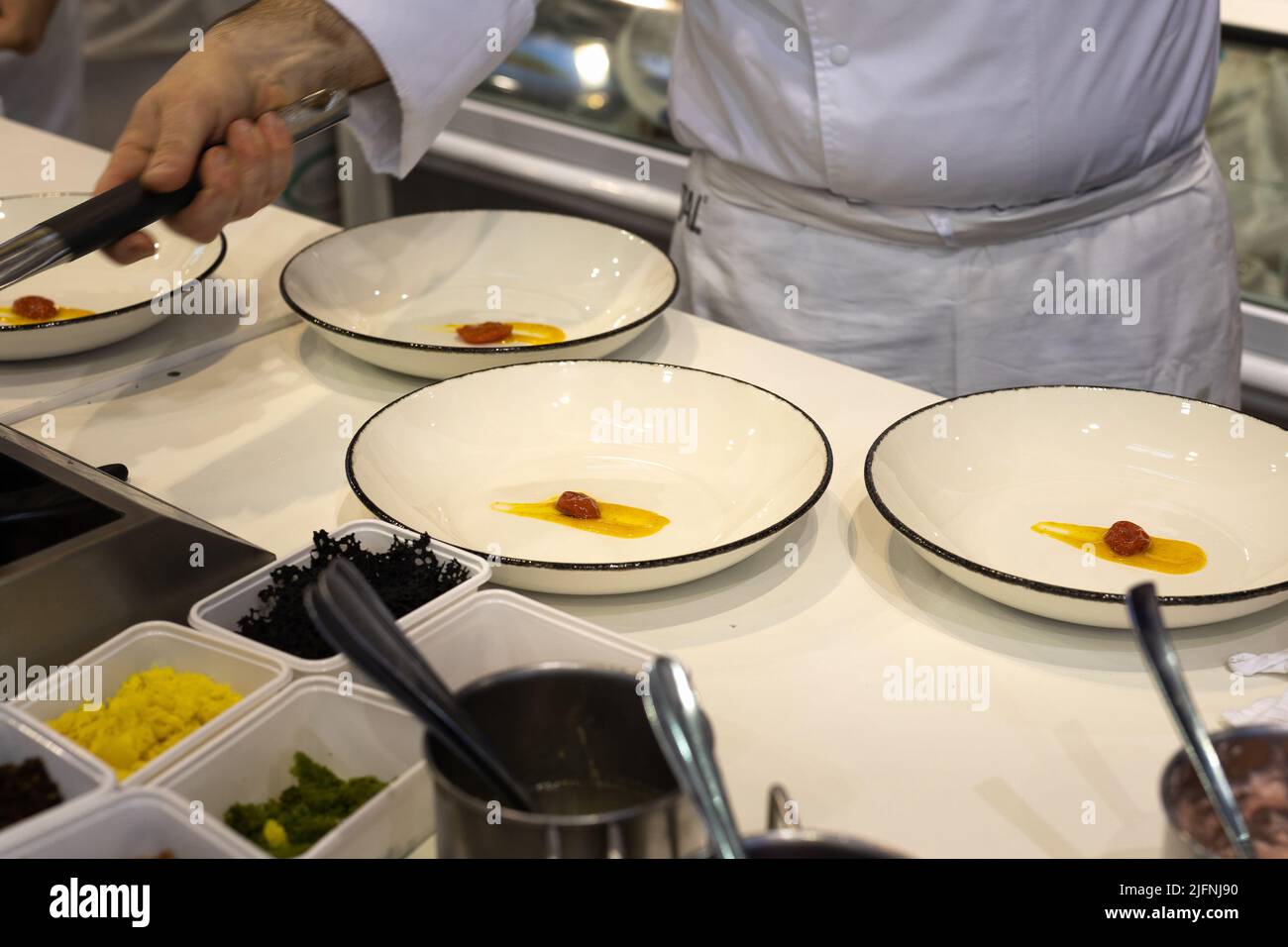 Chef of a Restaurant who is going to Plate the Freshly Cooked Italian ...
