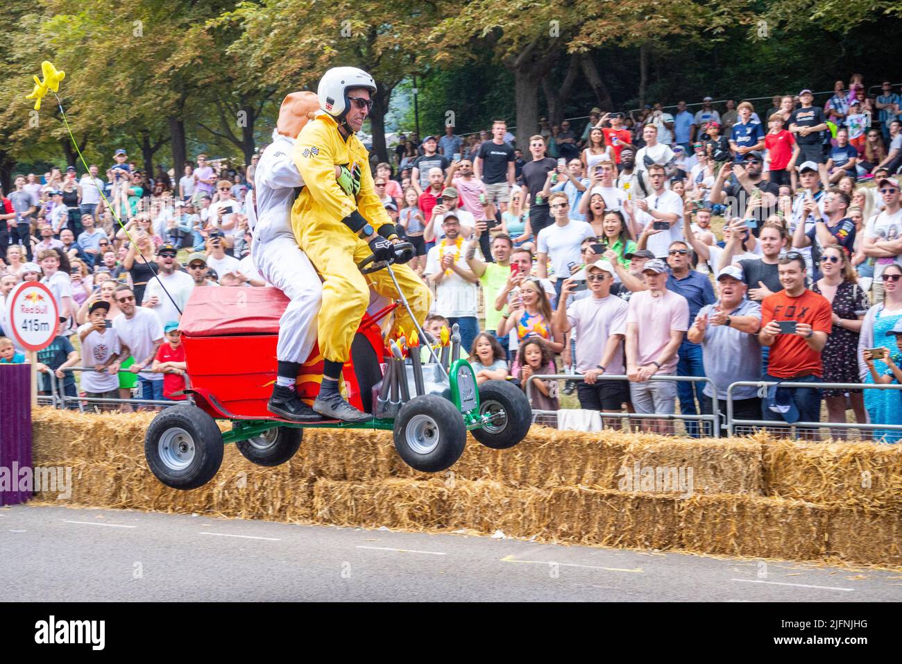 Team Peanuts kart taking the final jump at the Red Bull Soapbox race ...