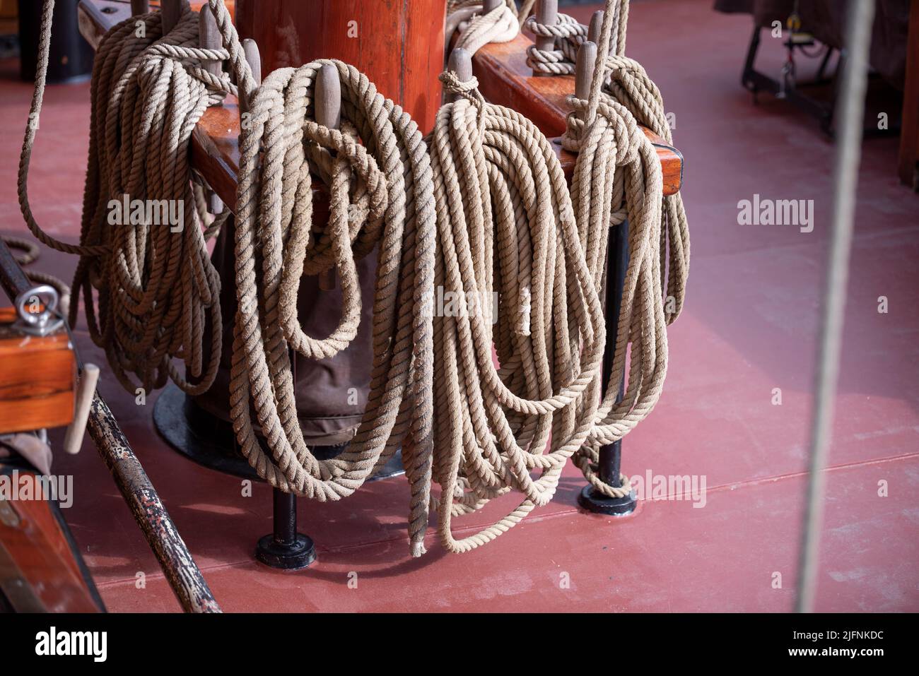 pile of ropes on the deck of a ship Stock Photo - Alamy