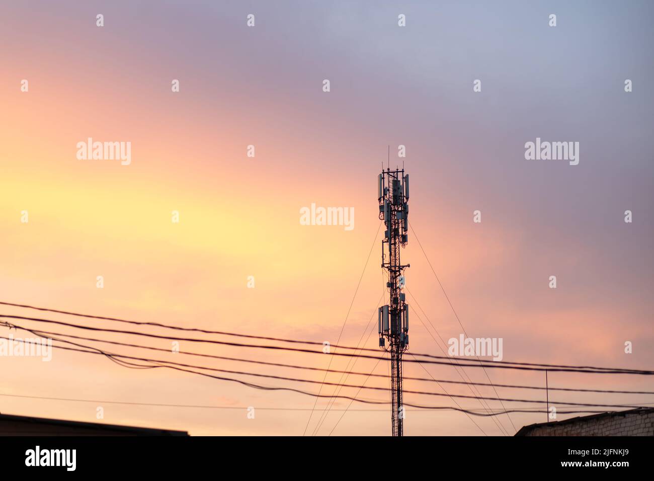Cell Tower Silhouette Against Orange Sunset Communication Tower ...