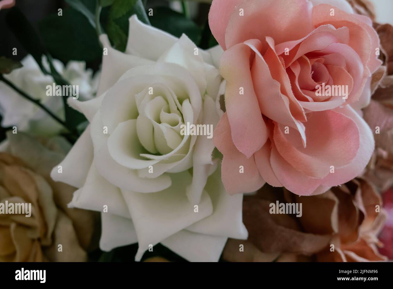Delicate roses. Artificial flowers. Flower arrangement Stock Photo - Alamy