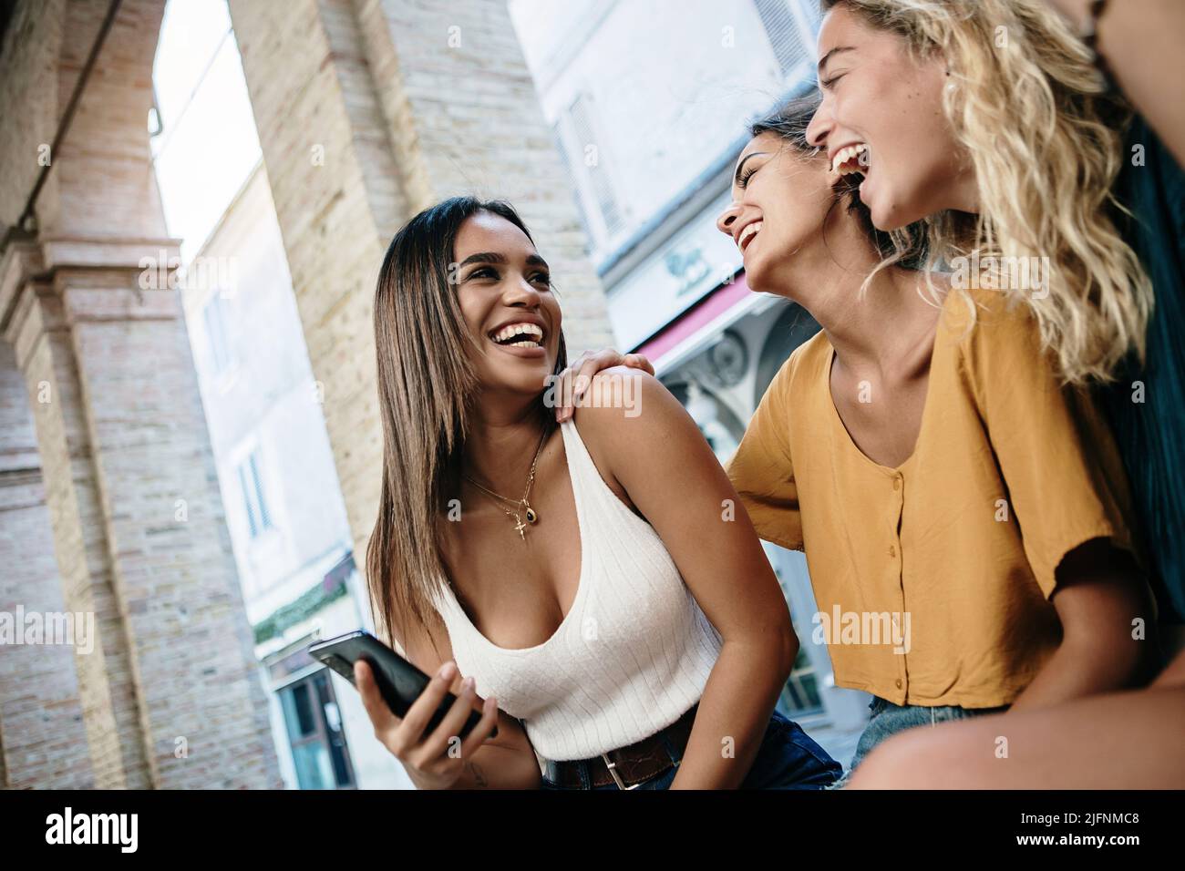 Happy female friends hi-res stock photography and images - Alamy
