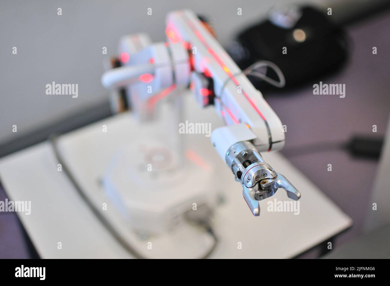 A closeup shot of a robotic arm under the experiment Stock Photo - Alamy