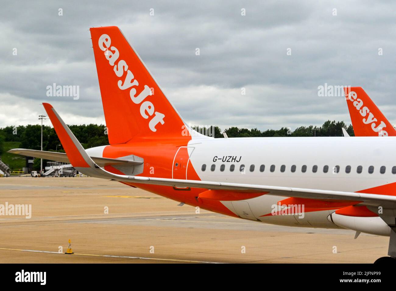 London, England - May 2022: Tail fin of an Easyjet Airbus A320 at the ...