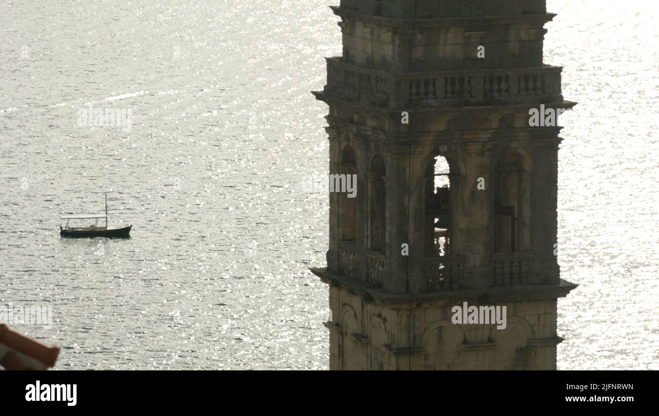 Large monuments standing next to the sea.Creative.A large stone tower ...