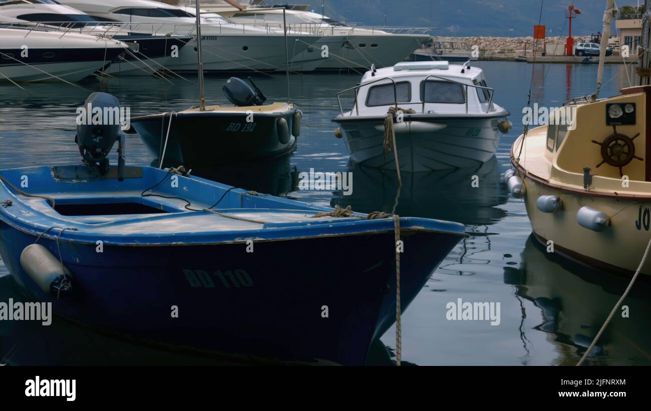 Empty boats.Creative.A landscape with rolling seas and small boats ...