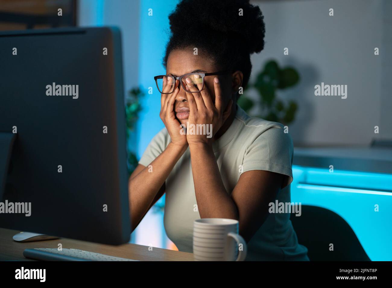 Overworked african woman freelancer feeling eye strain and fatigue ...