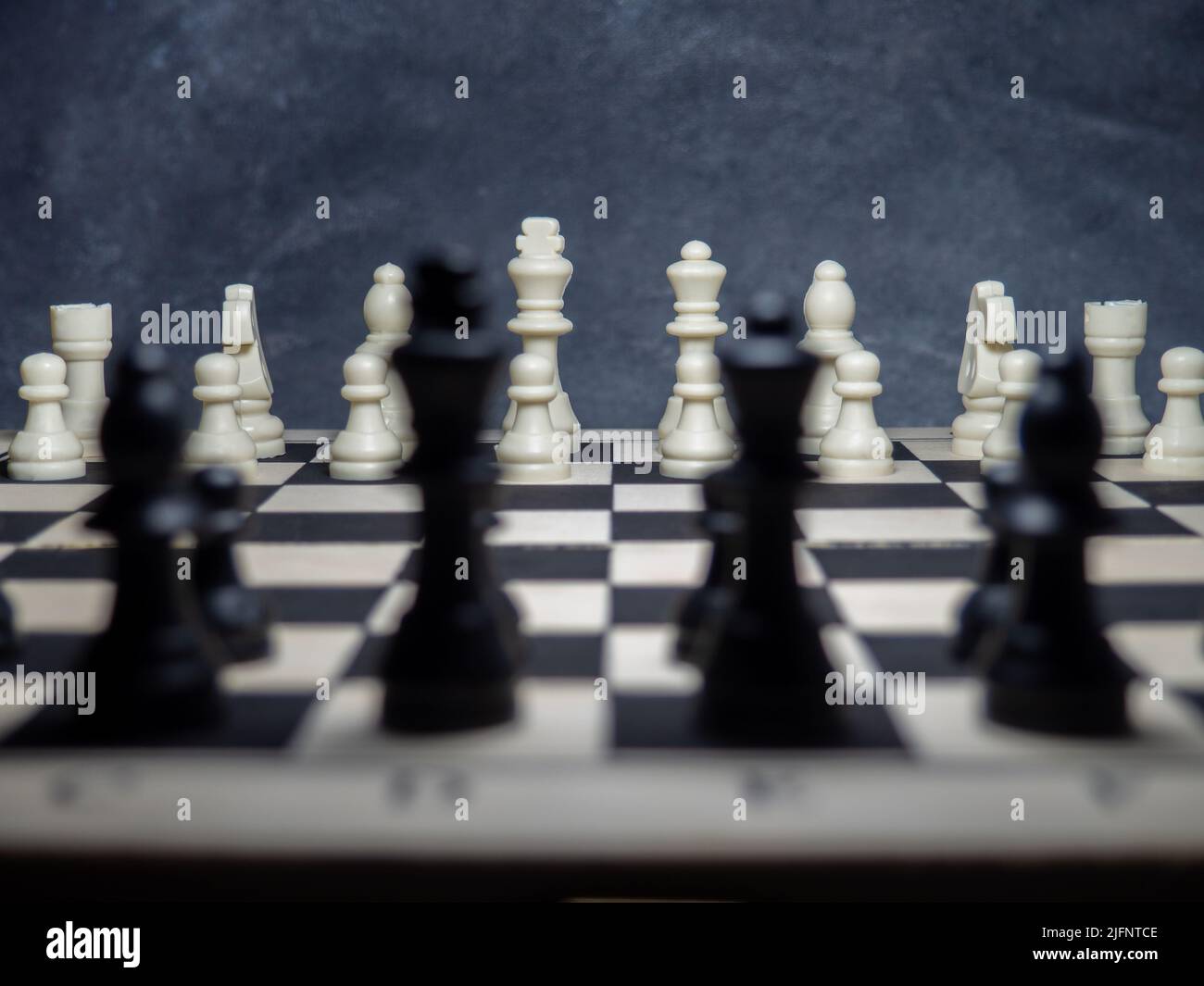 Chess. Chess pieces on the board. Board games. plastic figures. Counter ...