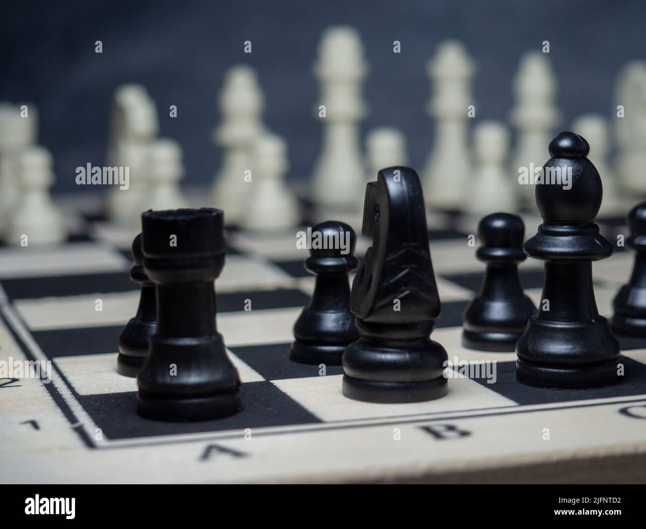 Chess. Chess pieces on the board. Board games. plastic figures. Counter ...