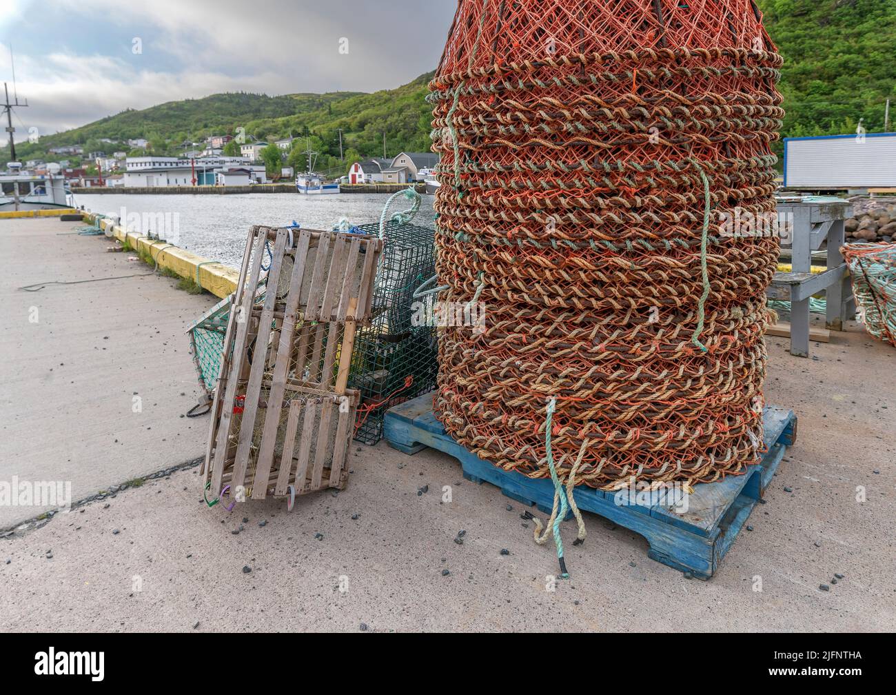 Crab and lobster traps on the dock in the town of Petty Harbour Stock ...