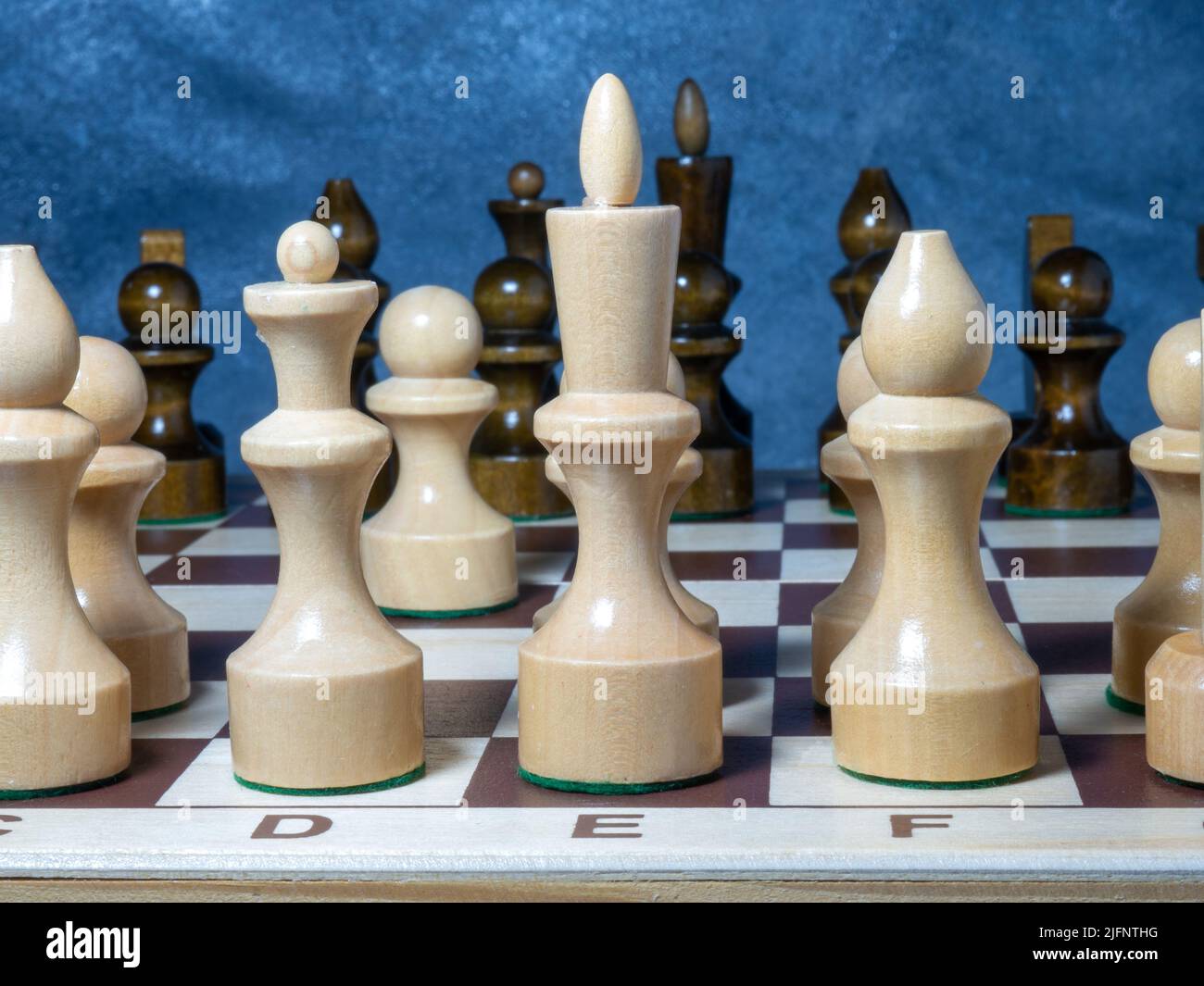 Chess board with figures. Wooden chess. Board games. Location of ...
