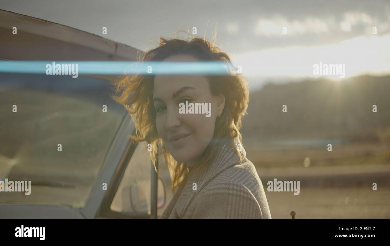 Beautiful woman rides in convertible. Action. Elegant woman rides in ...