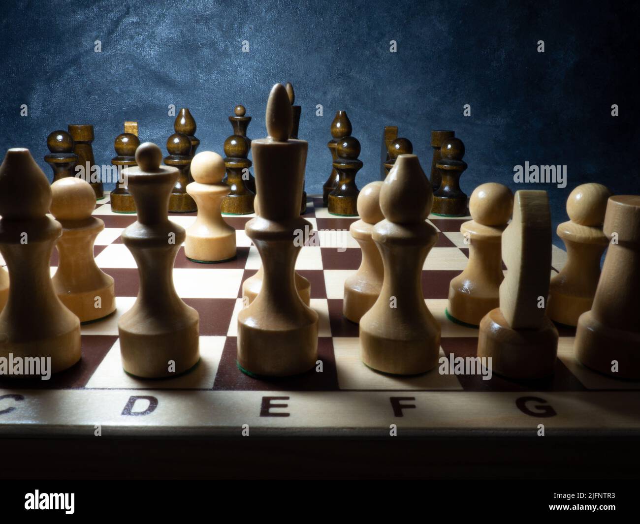 Chess board with figures. Wooden chess. Board games. Location of ...