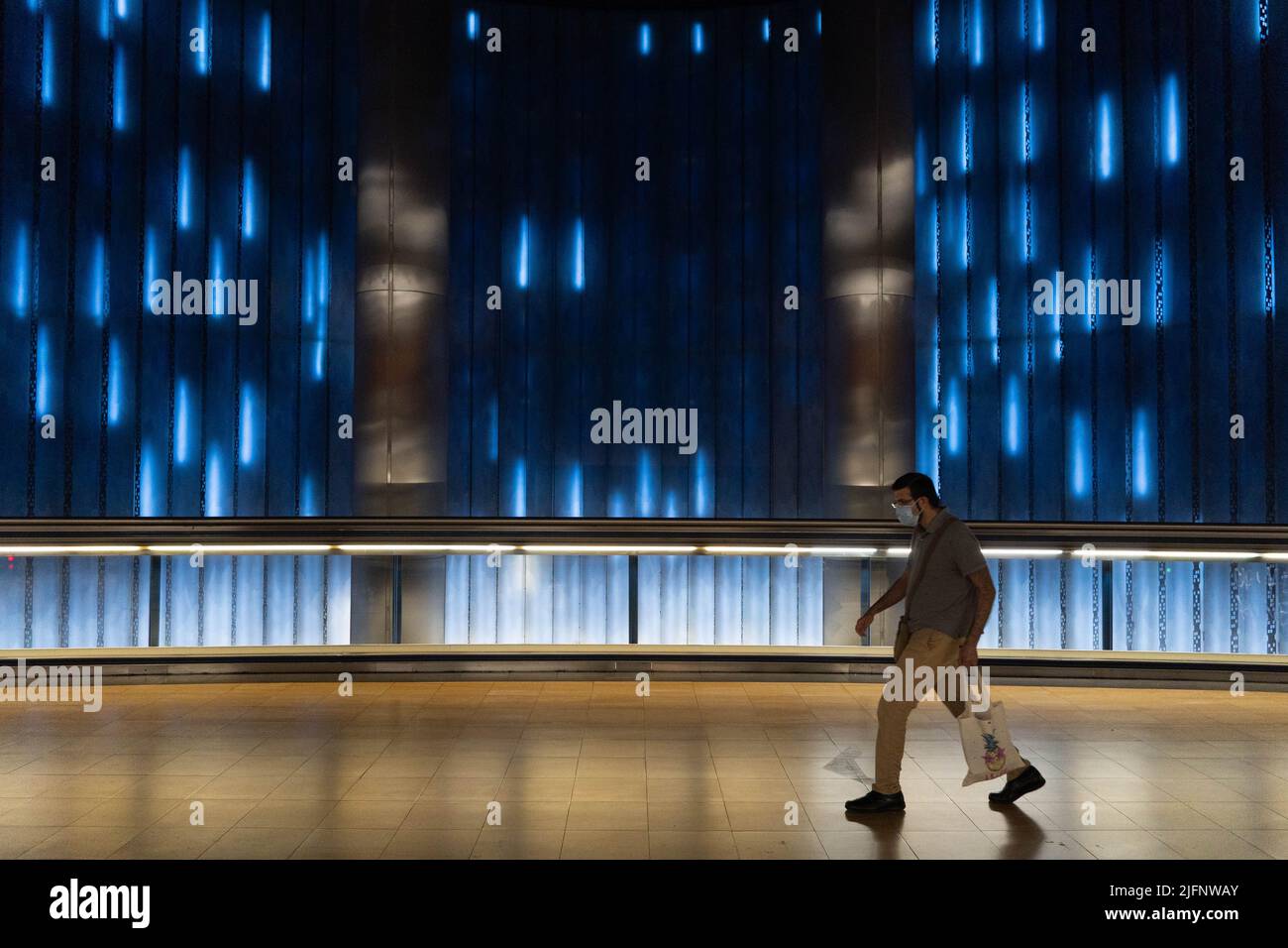 Madrid, Madrid, Spain. 3rd July, 2022. A man with a face mask walks ...