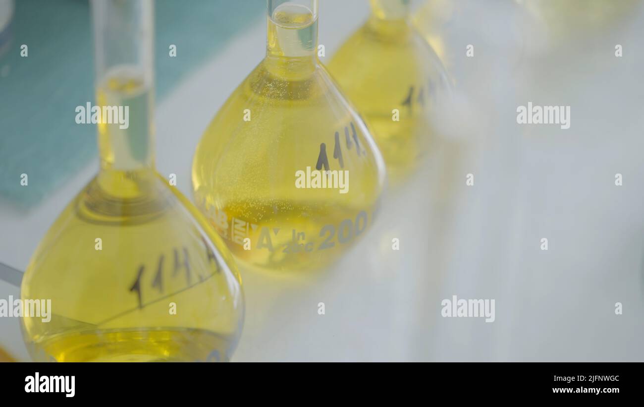 Glassware equipment in laboratory for science or chemical experiments ...