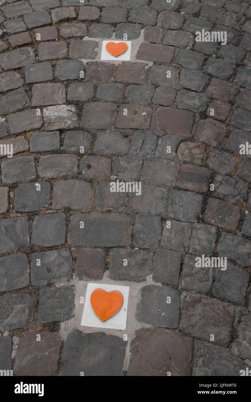 Heart encased in the stone pavement Stock Photo - Alamy