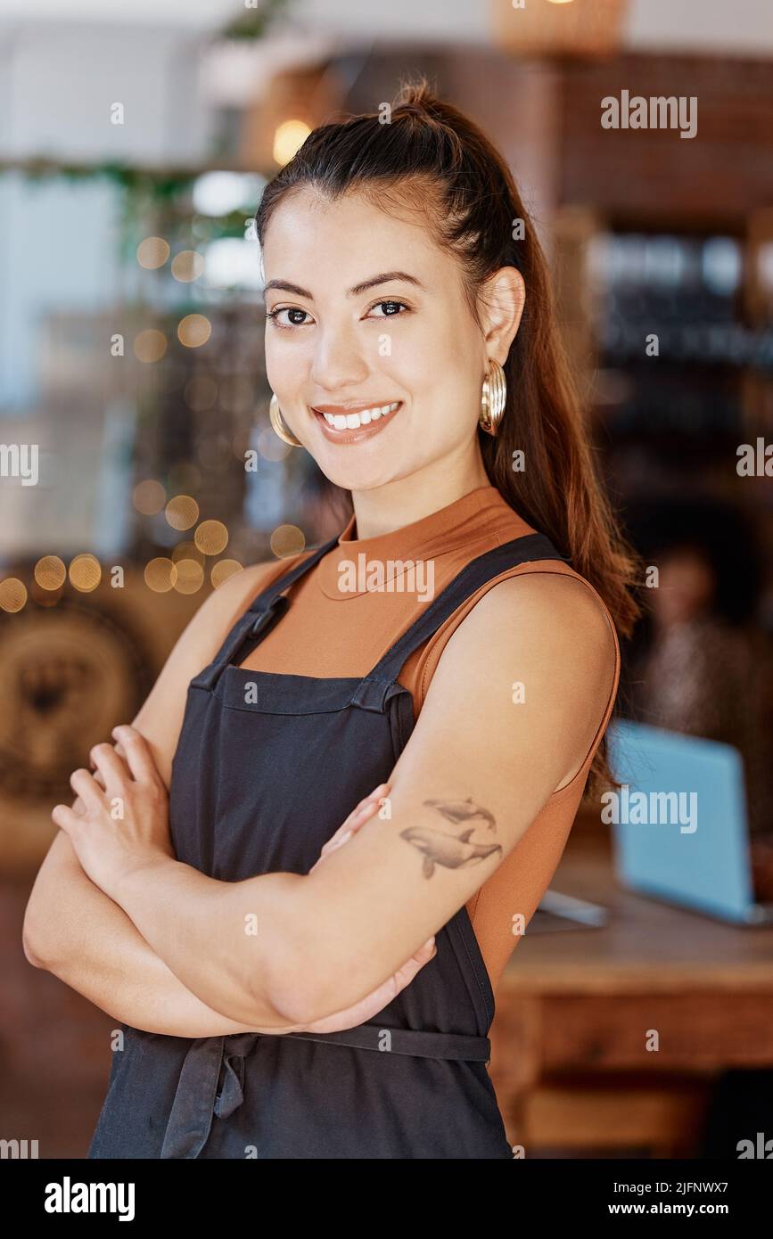 Portrait of one smiling beautiful asian business owner standing with ...