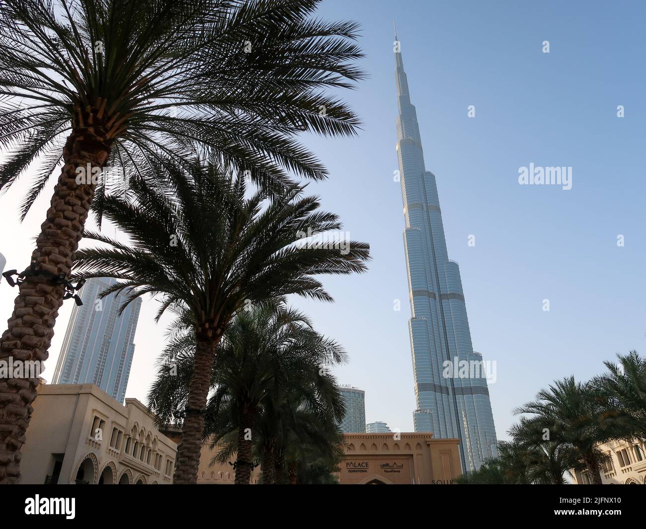 dubai skylinie with burj khalifa an sunset Stock Photo - Alamy