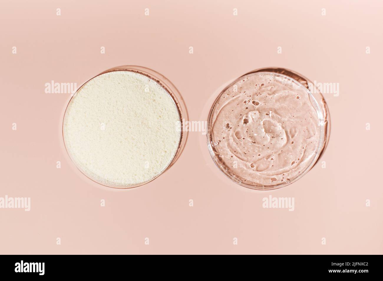 Samples of collagen powder and cosmetic gel in Petri dishes on a beige ...