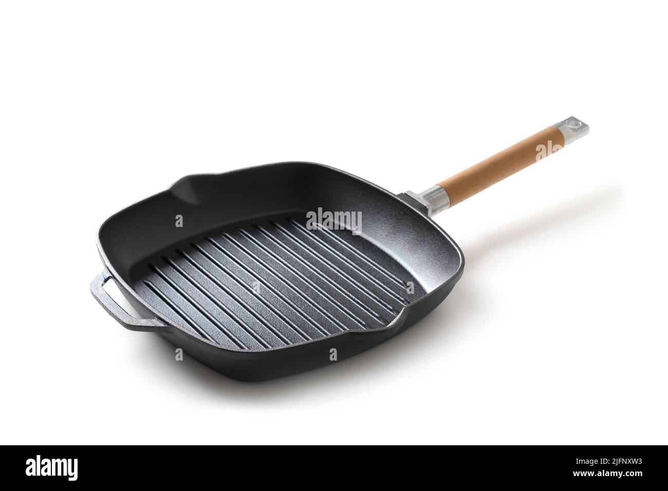 Empty cast iron grill pan with handle isolated on white background ...