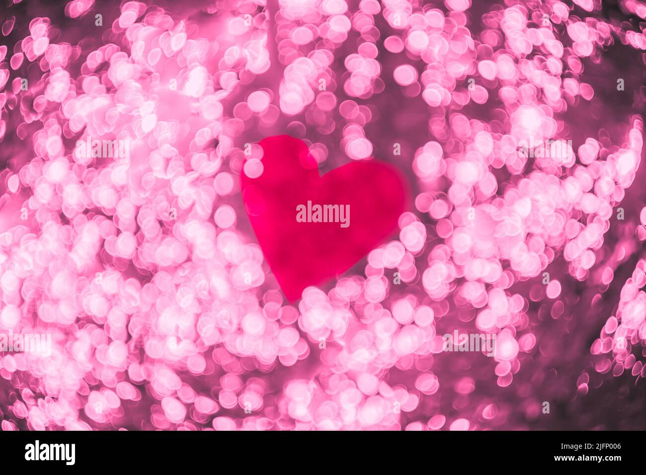 Shiny heart bokeh light Valentine's day background Stock Photo - Alamy