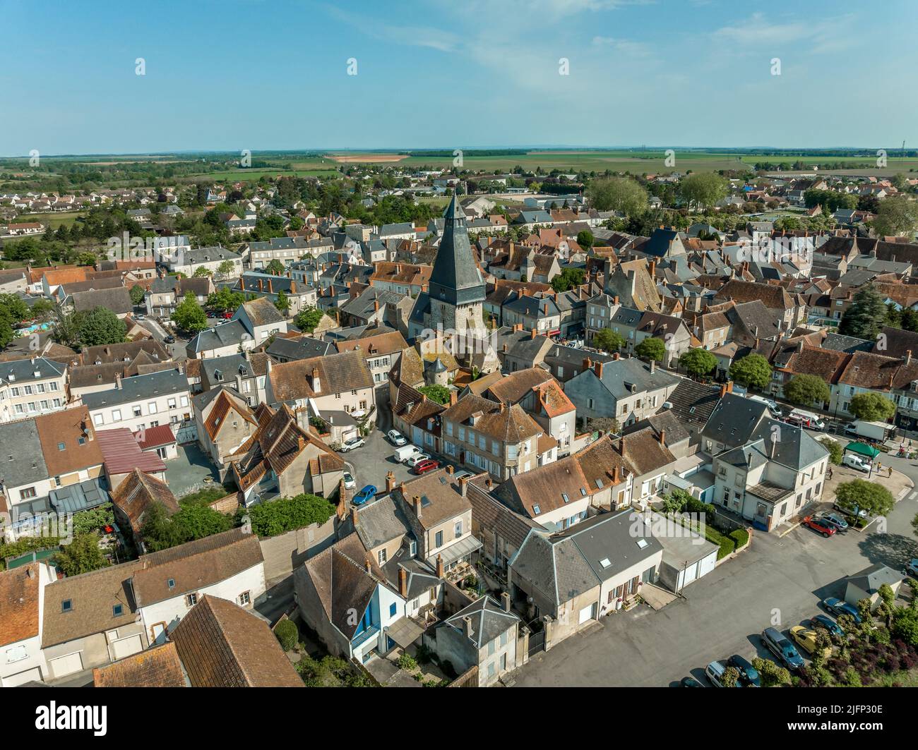 Aerial summer view of Dun sur Auron medieval French town with city ...