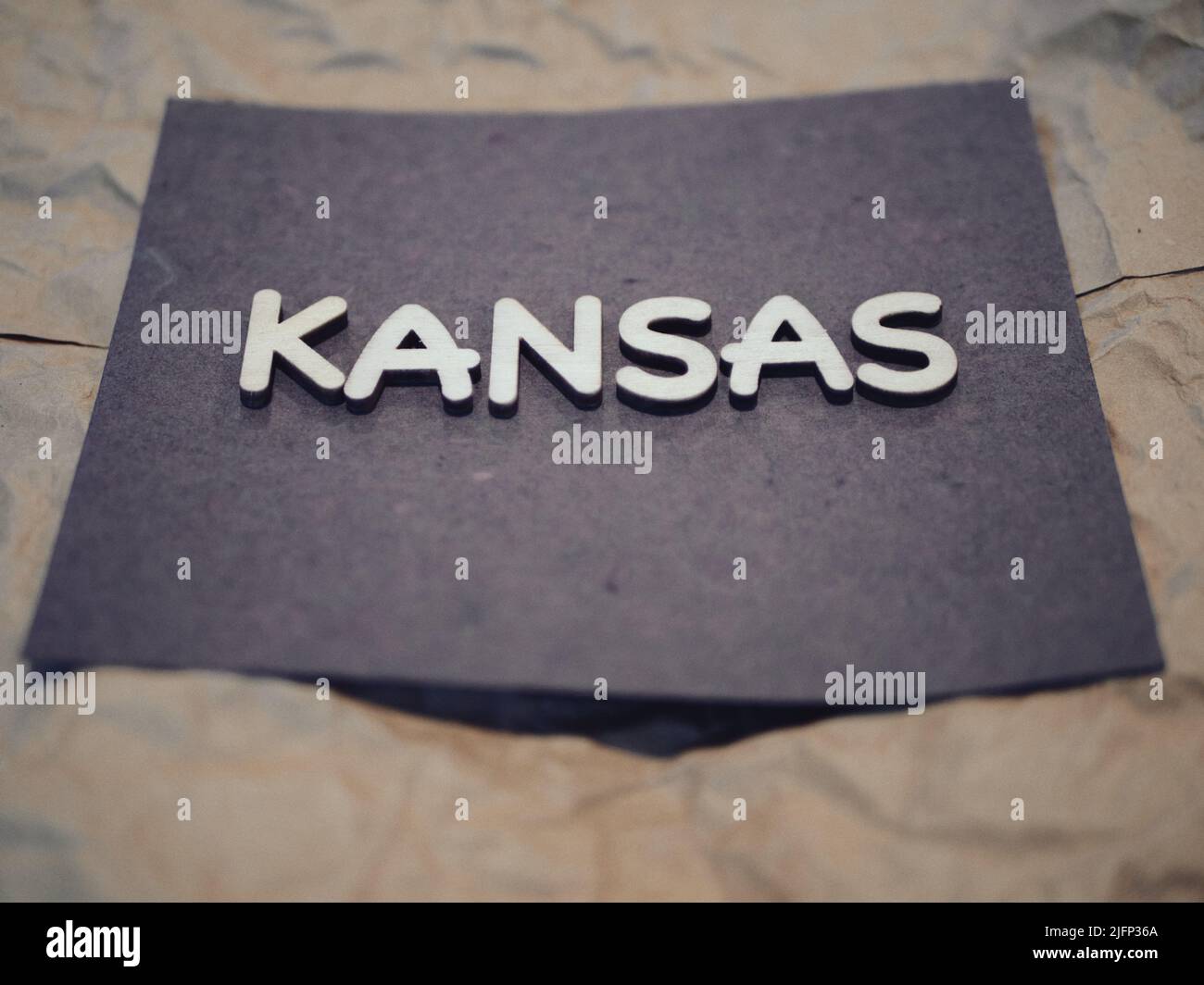 Kansas in wooden lettering. Show your love for the Sunflower State with ...